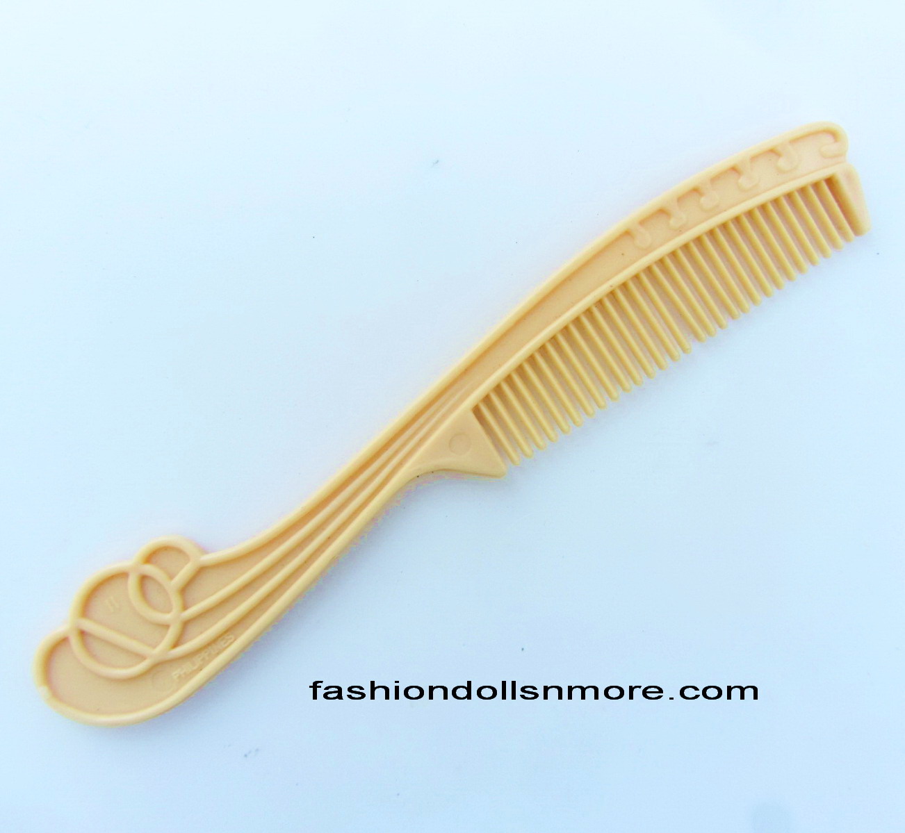 vintage-superstar-barbie-comb-light-tan fashiondollsnmore.com